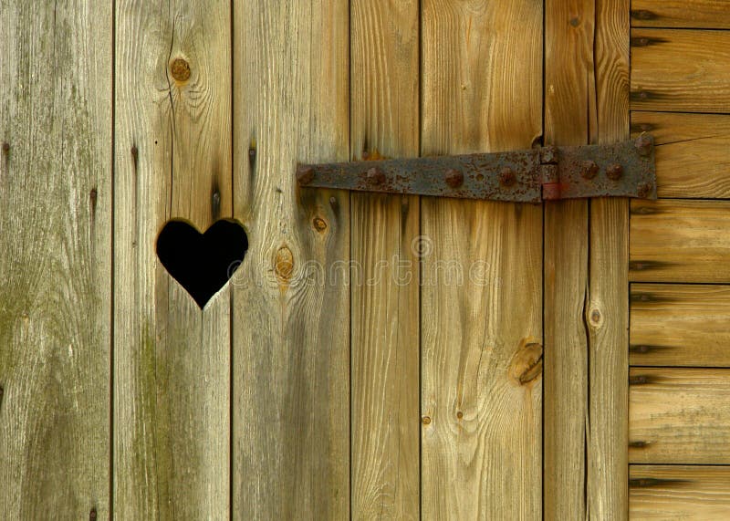 Hartvorm Bij Een Oude Houten Deur Van Een Toilet Stock Afbeelding ...