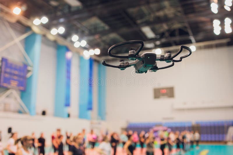 Hovering Drone Taking Pictures of Wedding Couple. Stock Photo - Image ...
