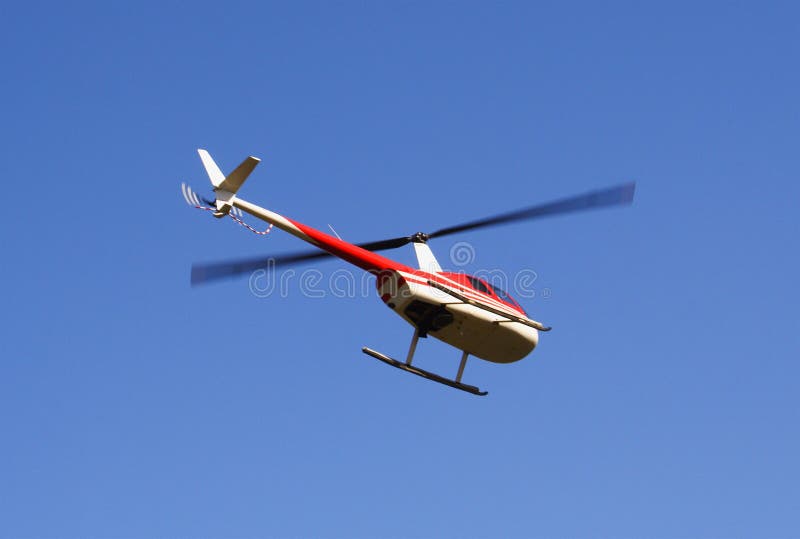 Hovering Helicopter stock image. Image of feet, industry - 45244301