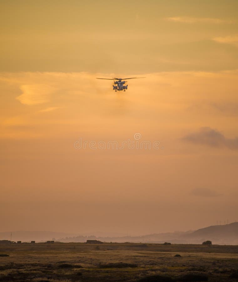 Hovering Helicopter stock image. Image of feet, industry - 45244301
