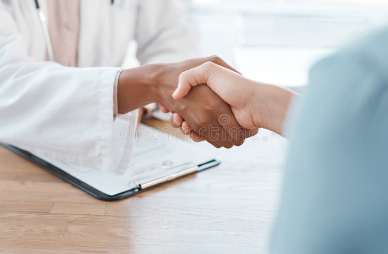 How Can I Help You. a Doctor Shaking Hands with a Patient in Greeting ...