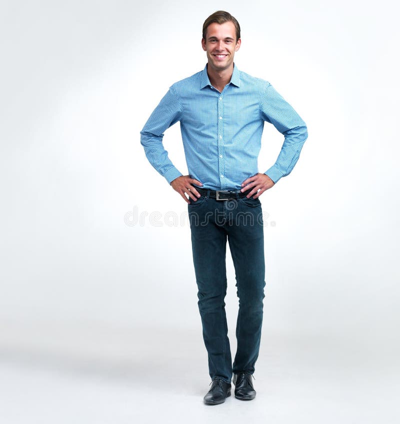 How Do I Look. a Handsome Young Man Standing in a Studio. Stock Photo ...