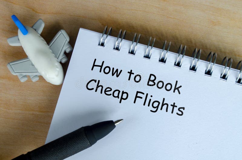 How To Book a Cheap Flights Text on White Notepad with Airplane and ...
