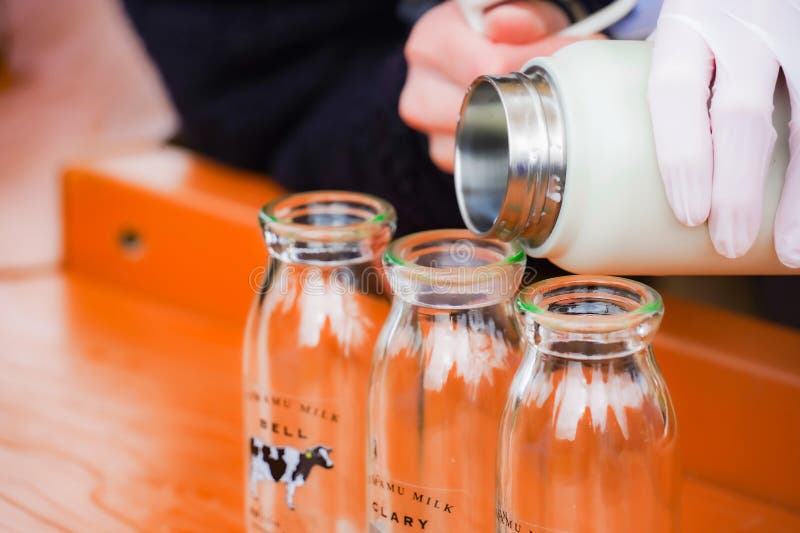 How to pour cold milk stock image. Image of hokkaido - 311263575