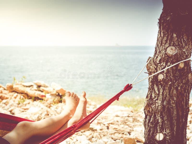 How to relax in hammock stock photo. Image of chair - 152563034