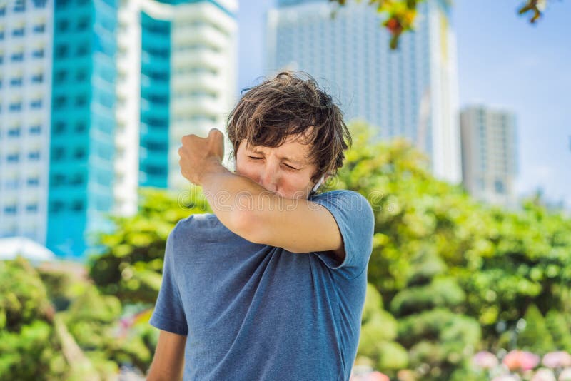 How To Sneeze Correctly. Woman Sneezes on the Elbow Stock Photo - Image ...