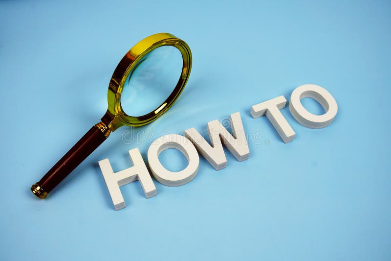 How To Word with Magnifying Glass Top View on Blue Background Stock ...