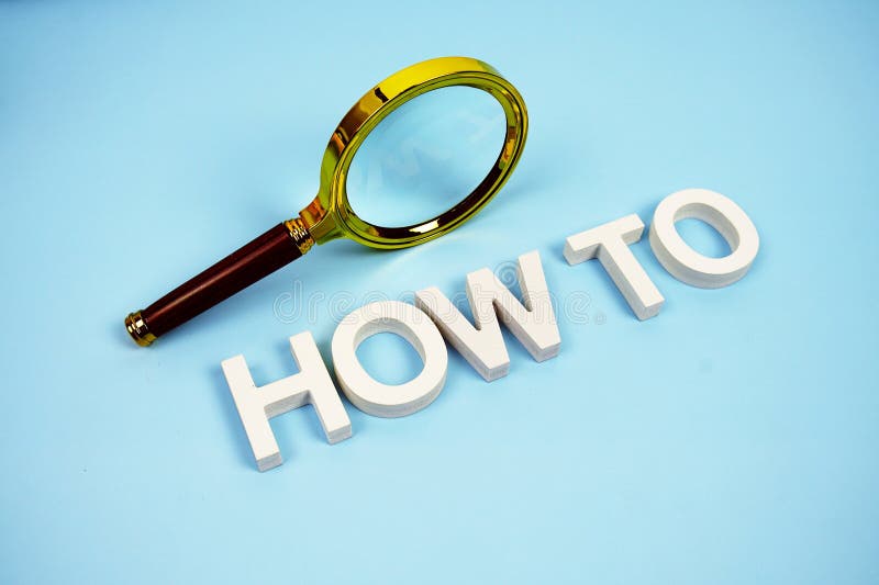 How To Word with Magnifying Glass Top View on Blue Background Stock ...