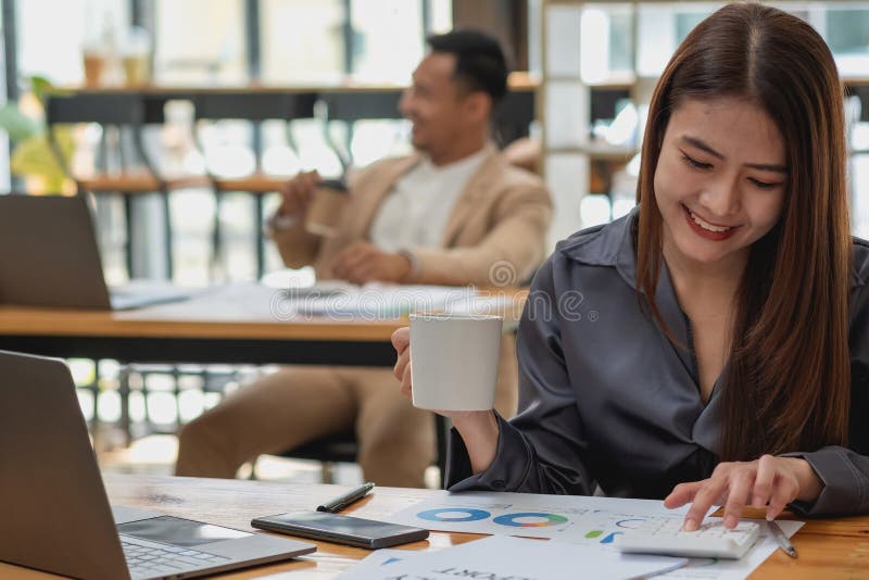 HR Workers Sit Back and Relax with Coffee on Their Desks with Their ...
