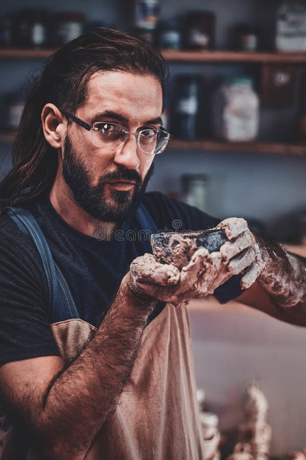 Hrdworking Man with Clay at His Own Studio. Stock Photo - Image of ...