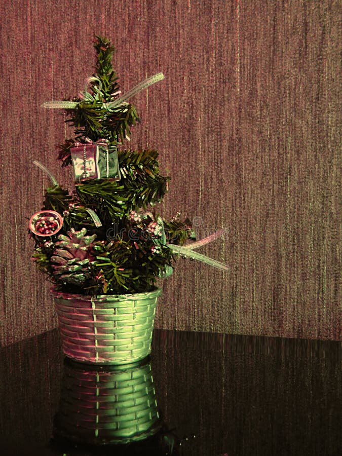 Hristmas Tree in a Silver Pot on a Reflective Surface Stock Photo ...