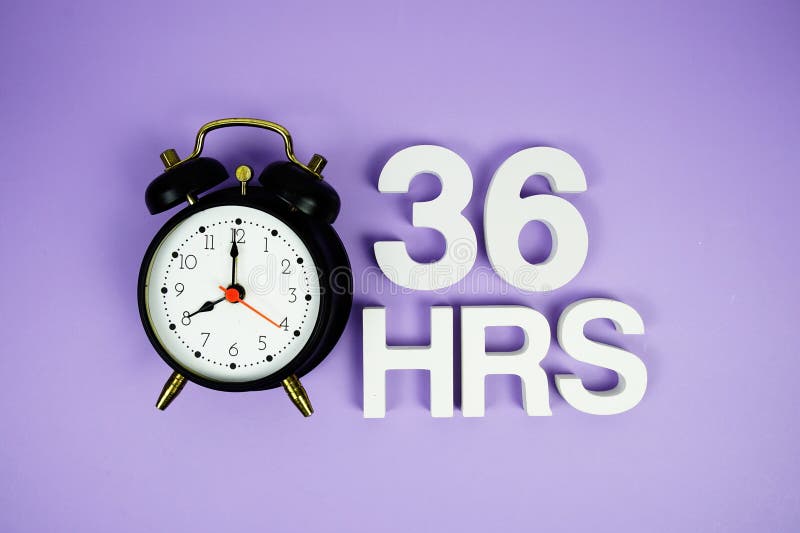36 Hrs Alphabet Letters and Alarm Clock Top View on Purple Background ...