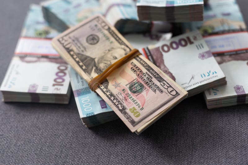 US Dollar Banknotes on Charts Graphs Paper. Financial Development ...