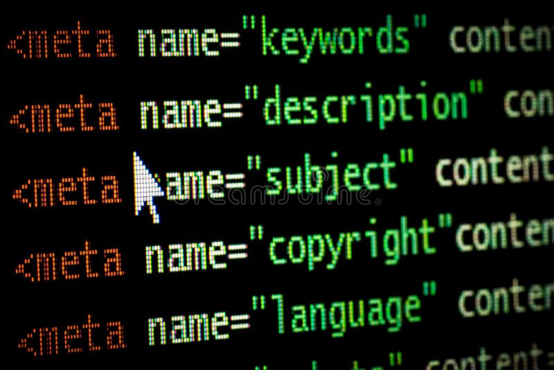 Html Web Page Computer Programming Code Meta Tags In Red Light And Dark Green With Mouse Pointer