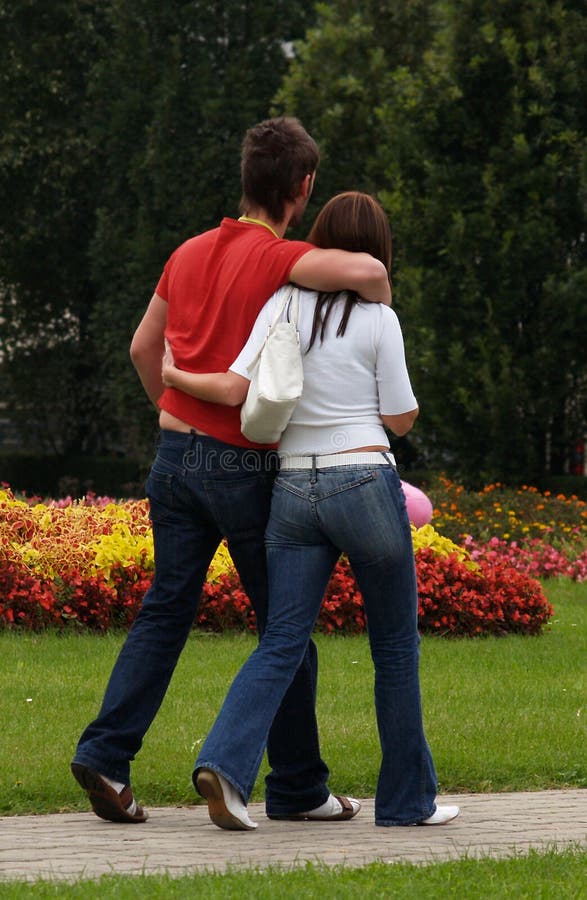 Young Couple Walking in the Park Stock Image - Image of park, boyfriend ...