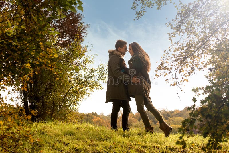 Romantic Couple Swing in the Autumn Park Stock Image - Image of fall ...