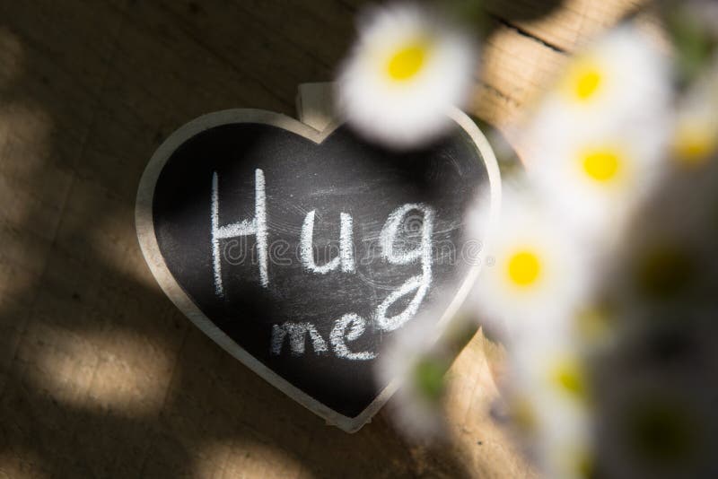 Hug Me Hand Drawing Phrase on a Heart, Share a Hug Day Concept Stock ...
