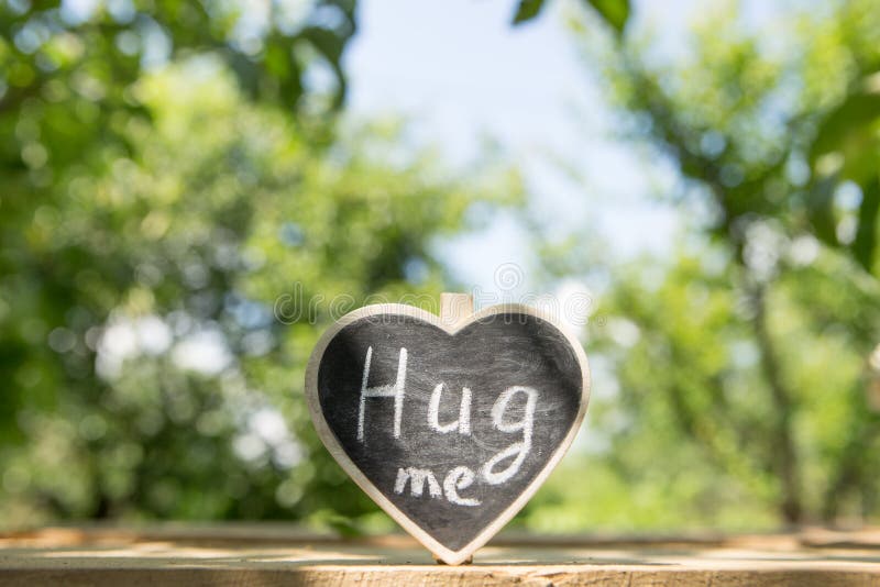 Hug Me Hand Drawing Phrase on a Heart, Share a Hug Day Concept Stock ...