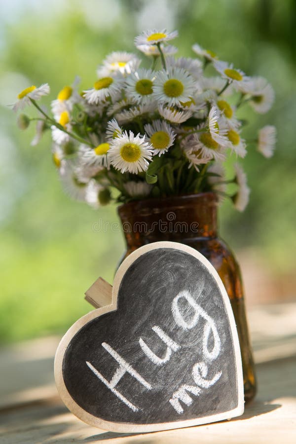 Hug Me Hand Drawing Phrase on a Heart, Sharing a Hug Concept Stock ...