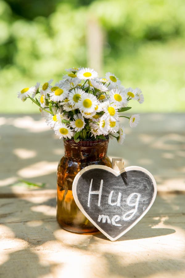 Hug Me Hand Drawing Phrase on a Heart, Sharing a Hug Concept Stock ...