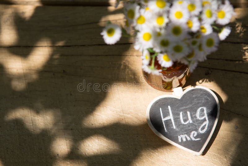 Hug Me Hand Drawing Phrase on a Heart, Sharing a Hug Concept Stock ...