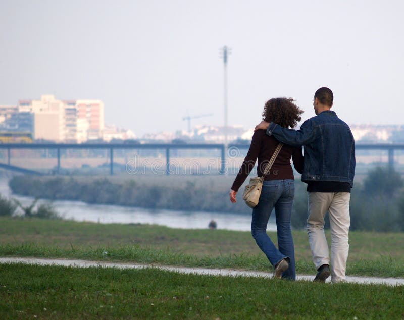 Young Couple Walking in the Park Stock Image - Image of park, boyfriend ...