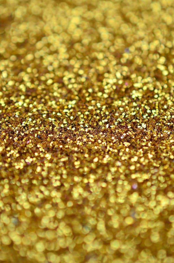 A Huge Amount of Yellow Decorative Sequins. Background Texture with ...