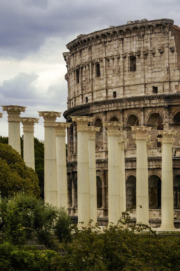 In the Foreground, are rows of Roman Pillars or Columns, and in the ...