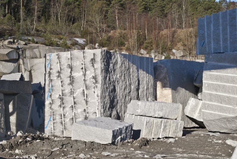 Huge Blocks of Stone in a Stone Quarry. Stock Photo - Image of drilling ...