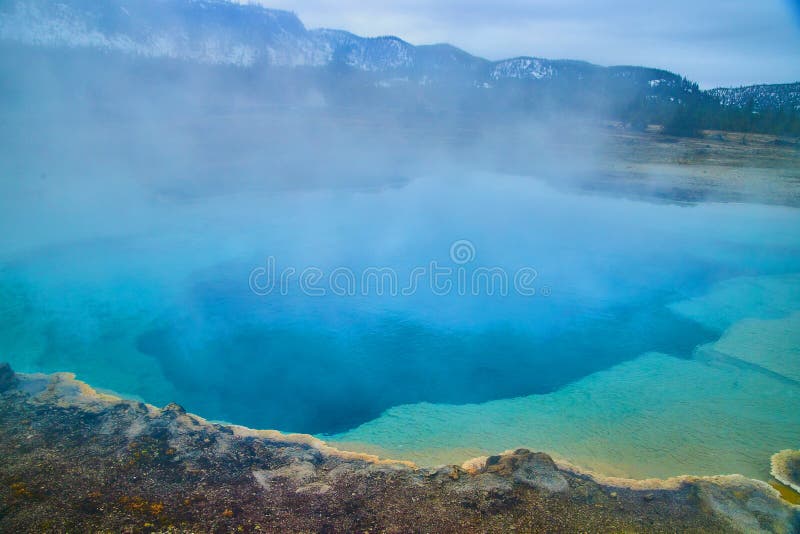Huge Blue Pool Emits Sulfur Steam in Yellowstone Basin Stock Photo ...