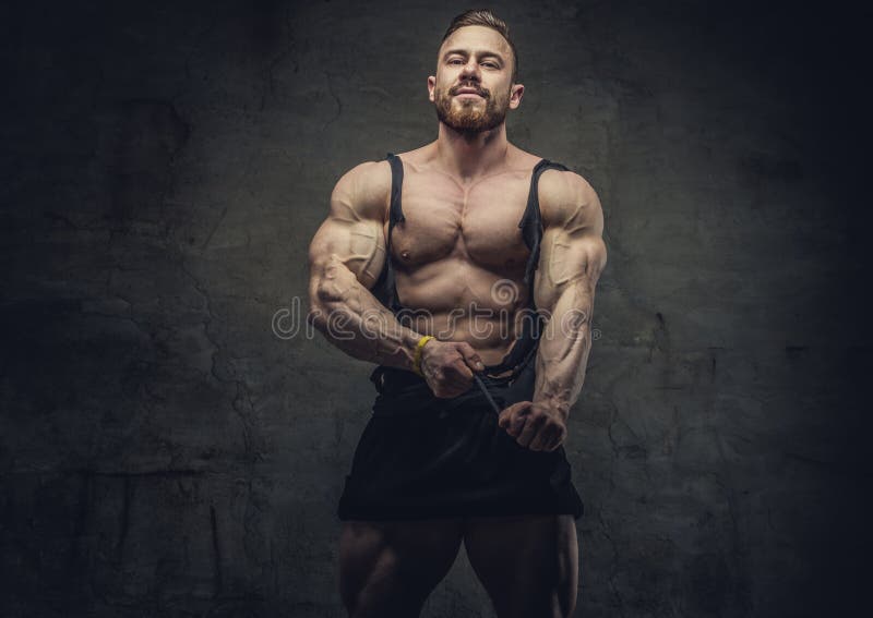 Huge Bodybuilder Rend His Garments. Stock Photo - Image of angry ...