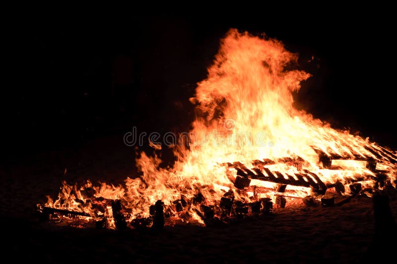 Huge bonfire on the beach stock image. Image of beach - 26551717