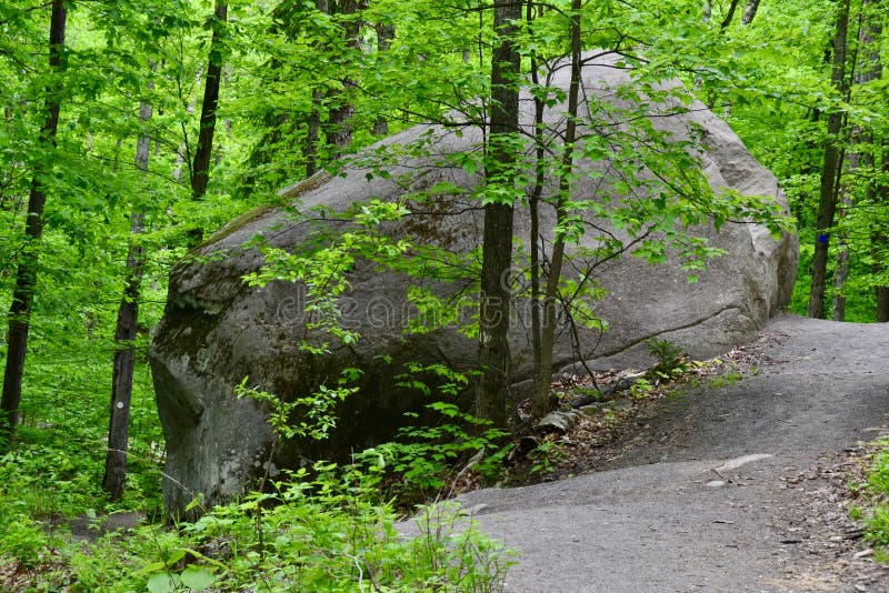Huge Boulder with Distinctive Banding Patterns Along Hiking Trail at ...