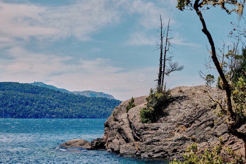 A Huge Boulder on the Shore of a Blue Lake Stock Image - Image of relax ...