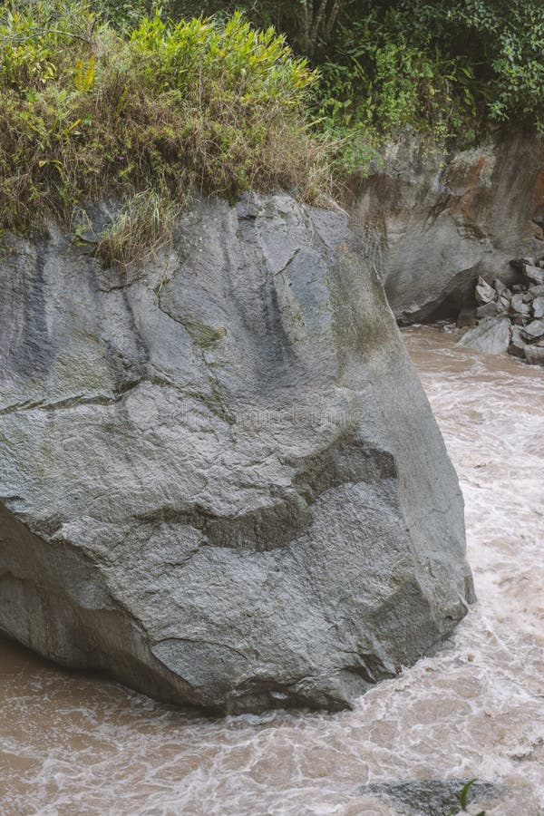 Huge boulder in water stock image. Image of rain, landscape - 207951927