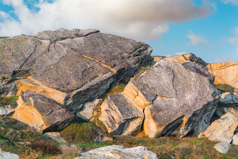 Huge boulders on the shore stock photo. Image of shore - 214694498