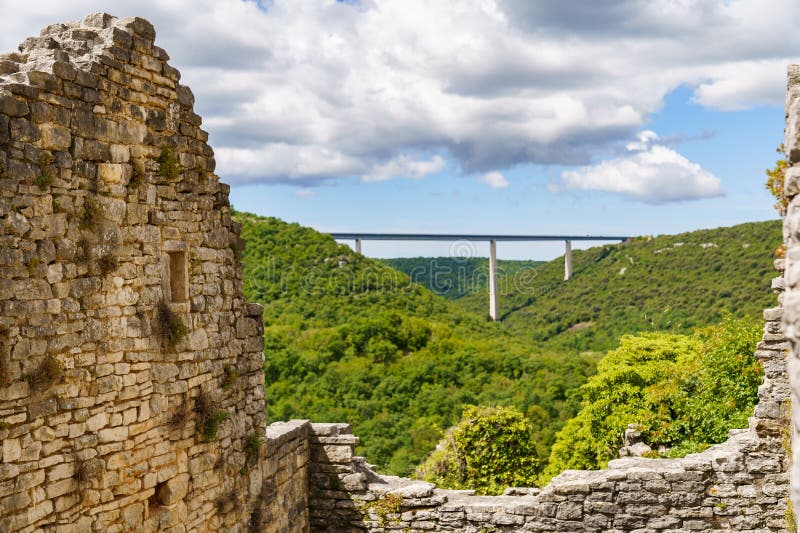 A Huge Bridge on Three Supports Over a Valley between Two Forested ...