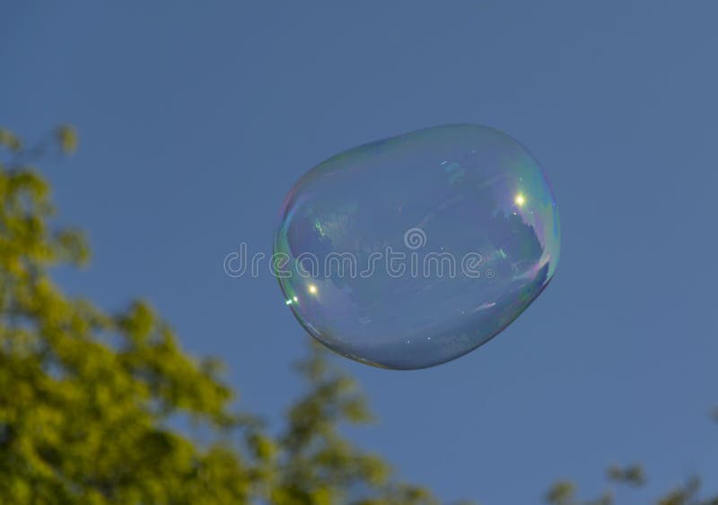 Huge Bubble Emerging from White Bathtub in Tall Yellow Grass Field ...