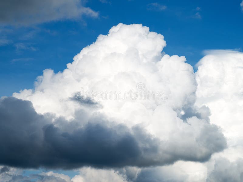 Huge clouds stock image. Image of fluffy, blue, scenic - 85982887