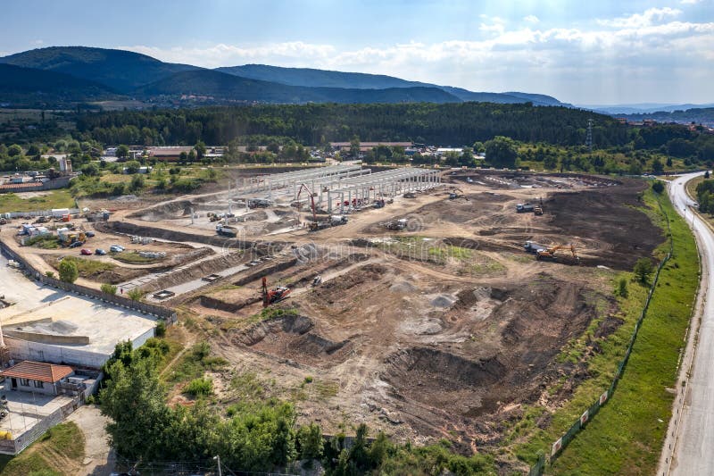 Huge Construction Site with Many Working Heavy Machines Stock Image ...