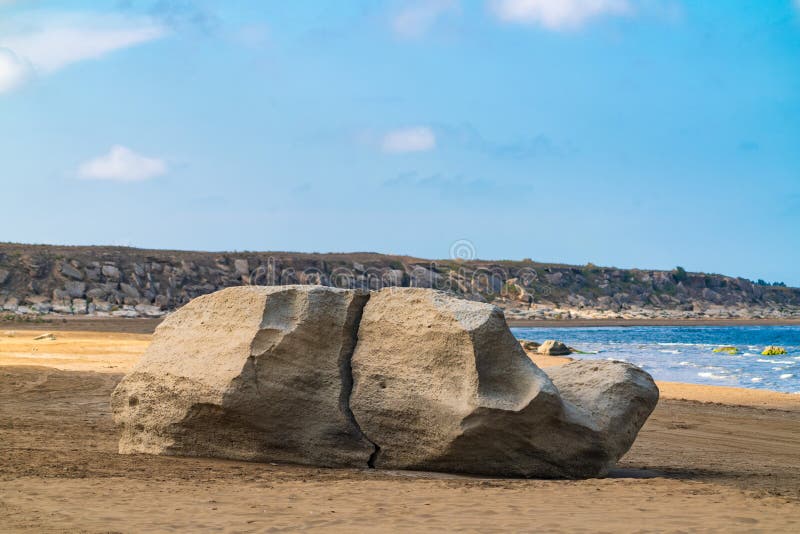 Huge Cracked Boulder on the Beach. Nature Wallpaper Stock Photo - Image ...
