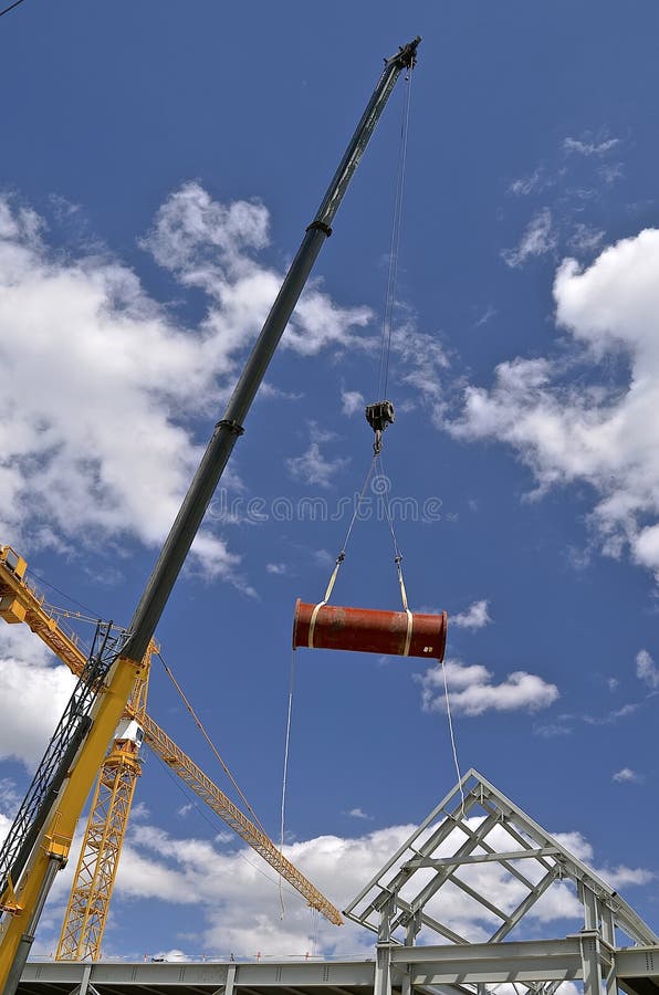 Huge Crane Moving a Section of Pipe Stock Image - Image of cable, tool ...