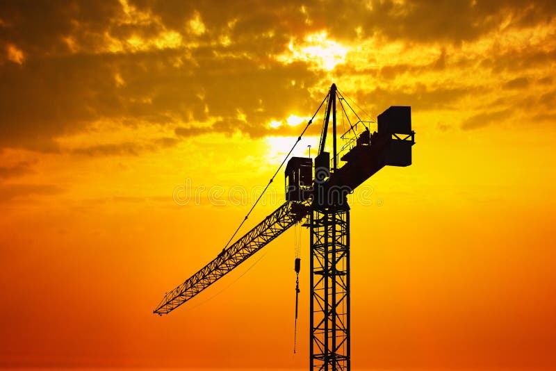 Crane at sunset stock image. Image of city, lifting, business - 29761627