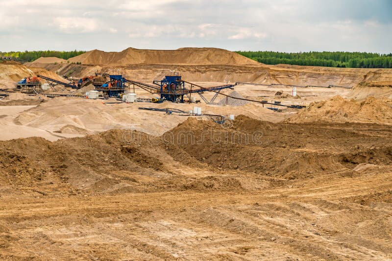 Huge Digger in Quarry for Sand Extraction Mining in Lake Stock Image ...