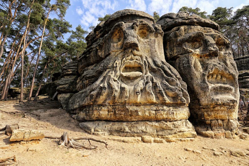 Huge Faces of Devils in the Sand Rock Stock Image - Image of ghost ...