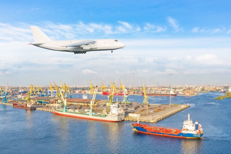 Huge Freight Airplane Landing Approach Over the Cargo Seaport Stock ...