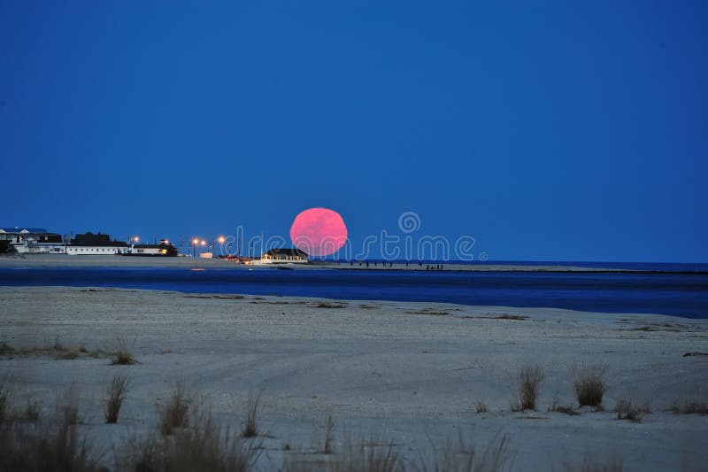 Large Full Moon Over Beach Moon Over Ocean Waves Hi Res Stock