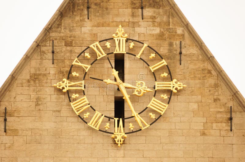 Huge Golden Clock on the Facade of a Building. Architectural Detail ...