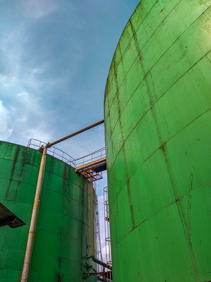 Huge green storage tank stock image. Image of factory - 343300725