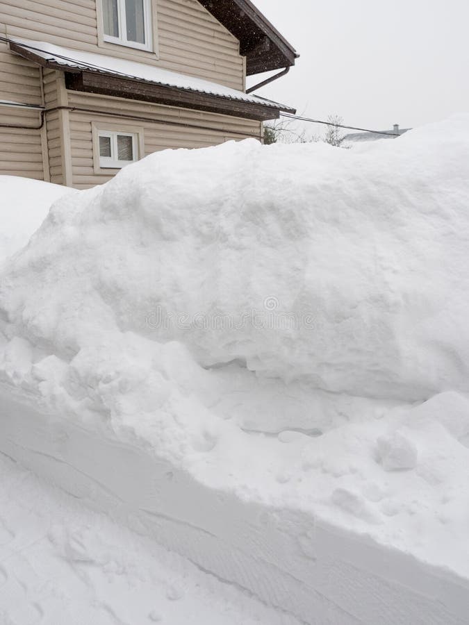 Huge Heap of Snow in Front of the House Stock Photo - Image of pile ...